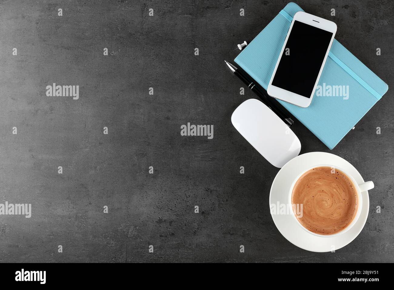 Top view of office desk with coffee and accessories Stock Photo - Alamy
