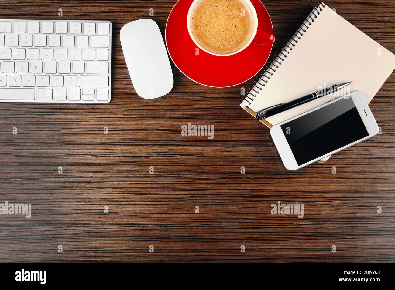 Top view of office desk with coffee and accessories Stock Photo - Alamy