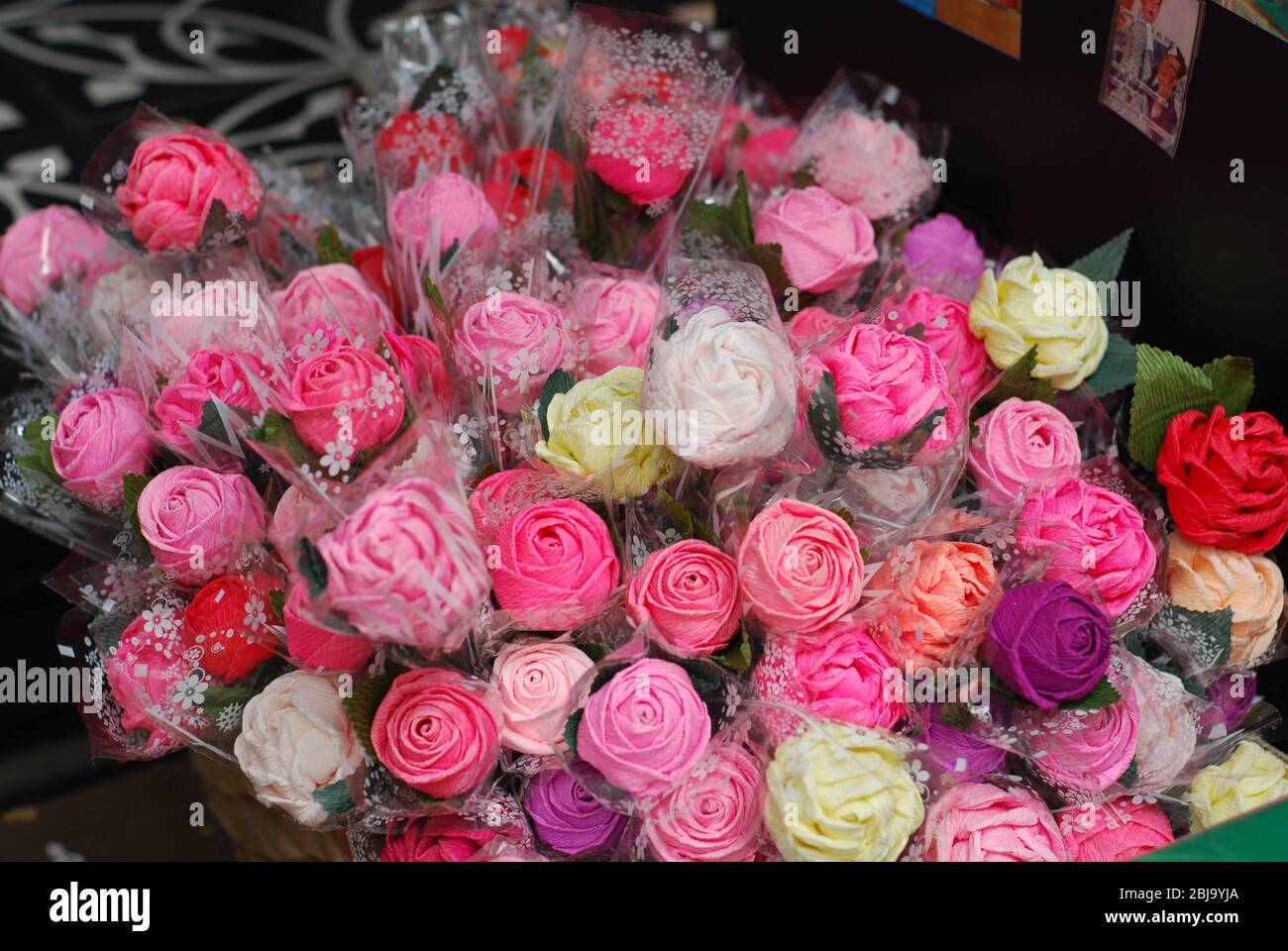 Fresh and Colorful roses bundle selling in the martket flower shop ...