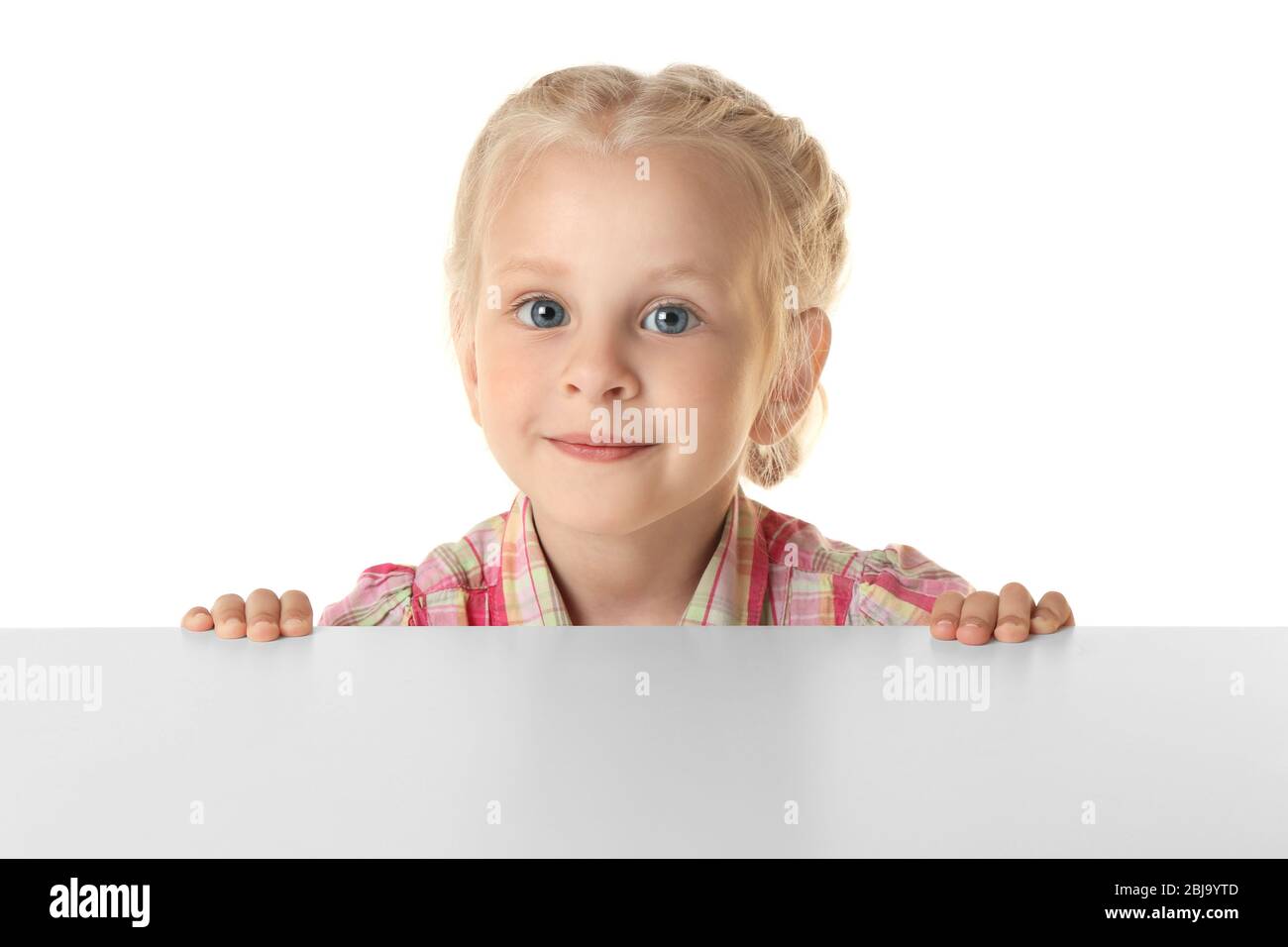 Girl standing behind table hi-res stock photography and images - Alamy