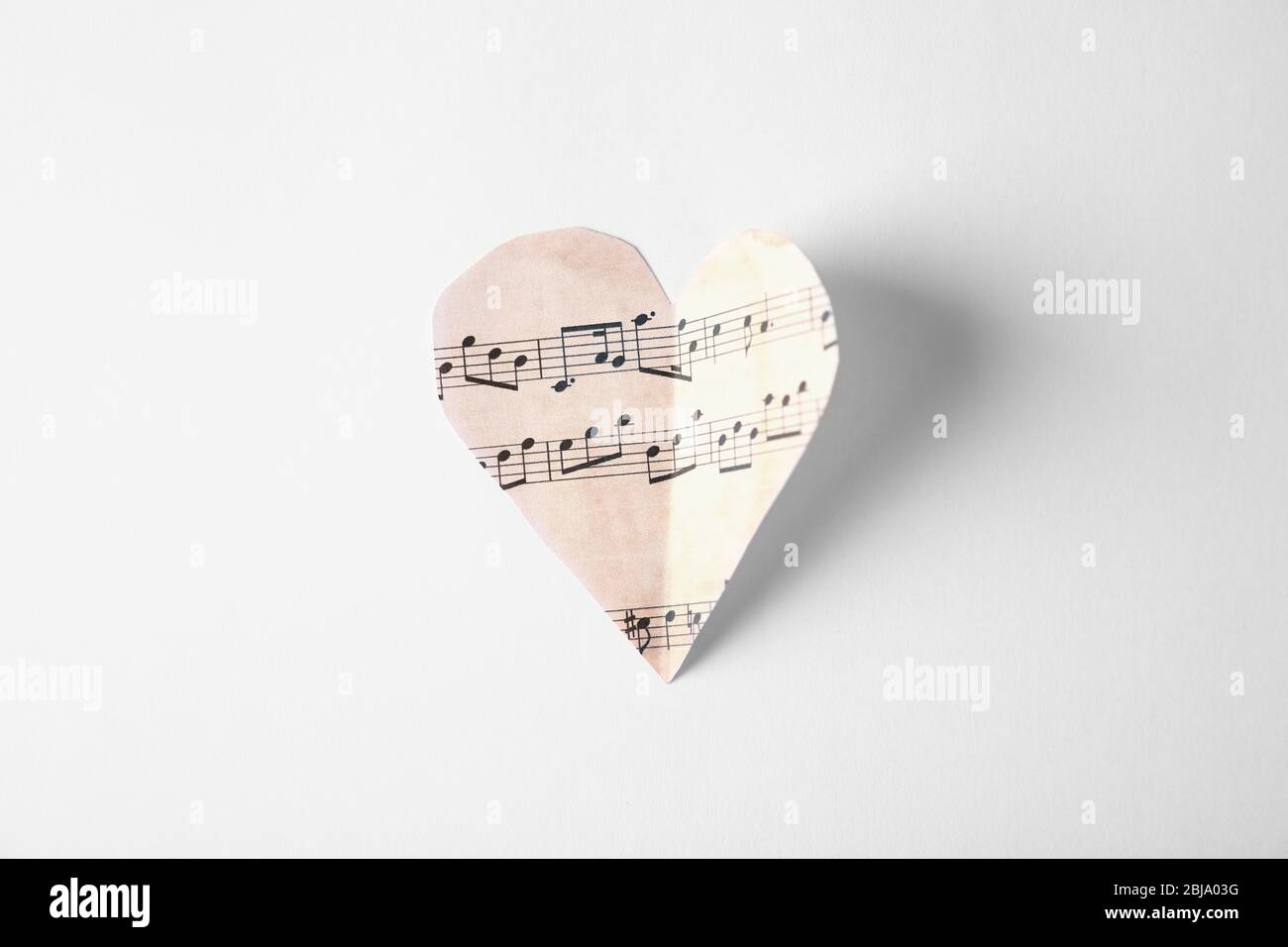 Paper heart with music notes Stock Photo - Alamy
