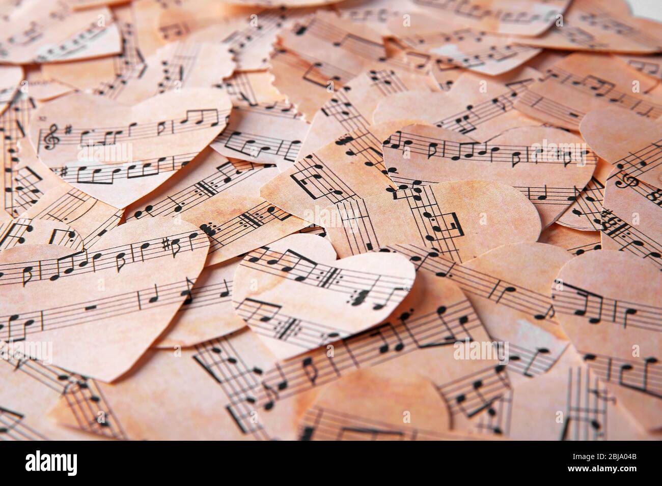 Paper hearts with music notes background Stock Photo - Alamy