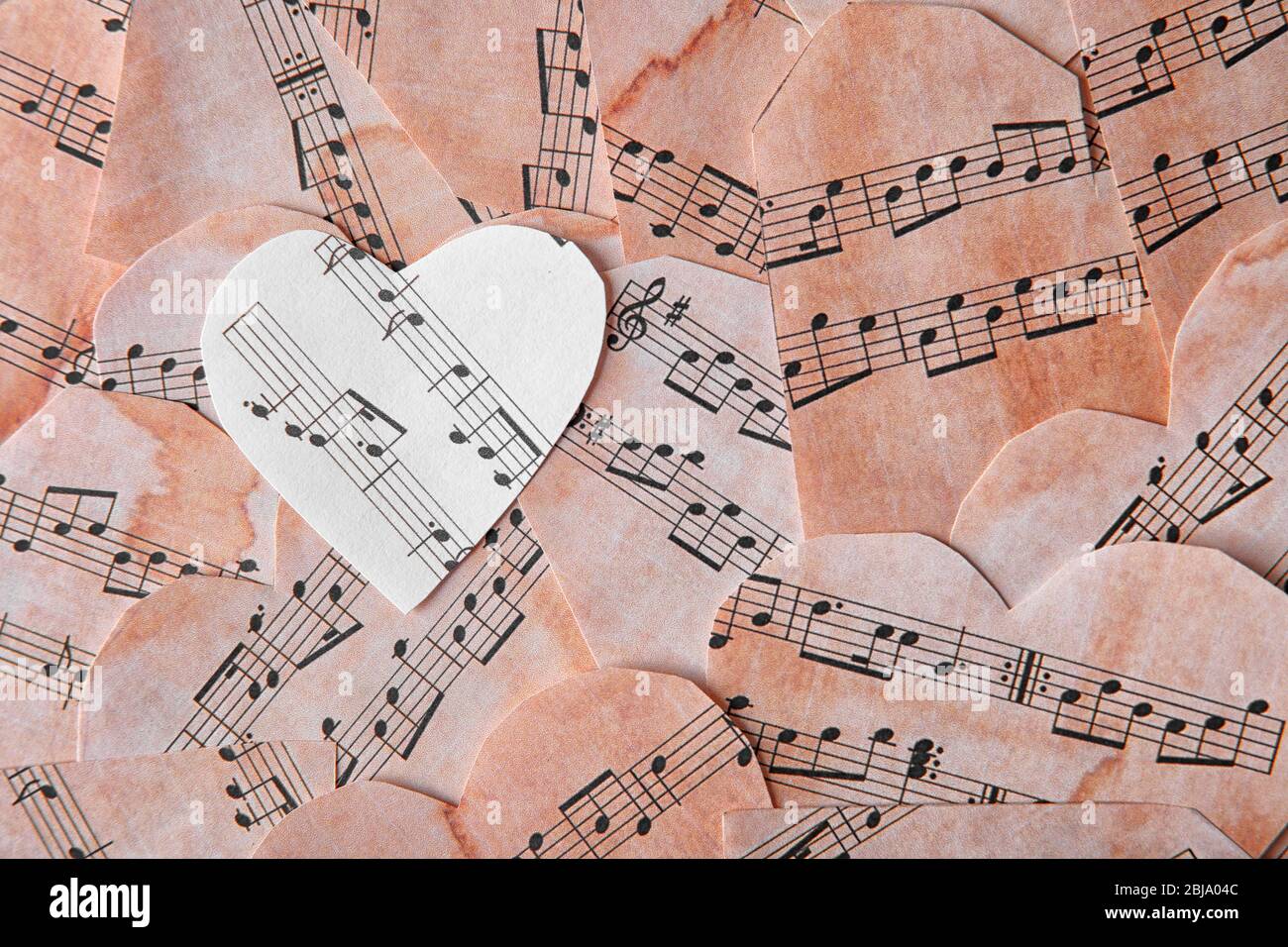Paper hearts with music notes background Stock Photo - Alamy