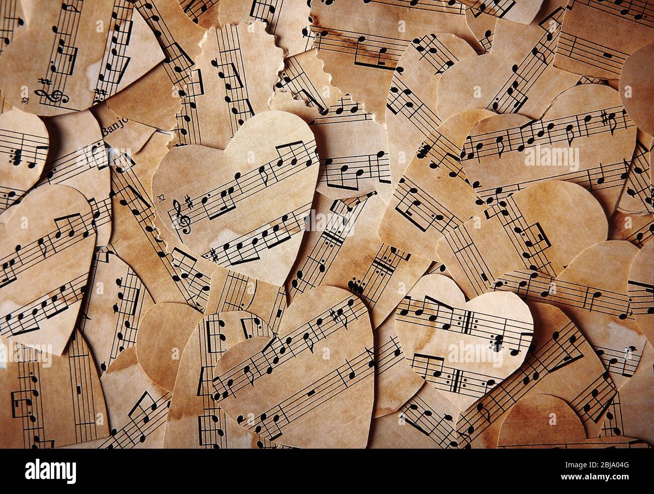 Paper hearts with music notes background Stock Photo - Alamy