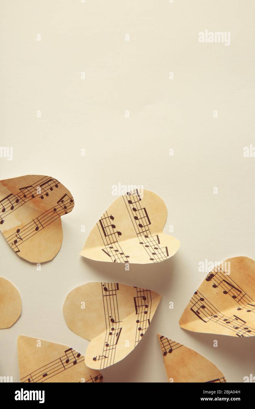Paper hearts with music notes on white background Stock Photo - Alamy