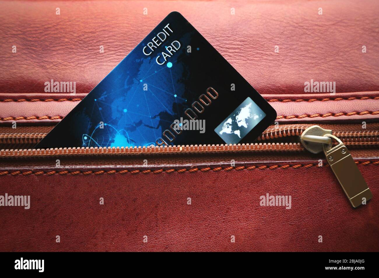 Credit card in pocket Stock Photo - Alamy