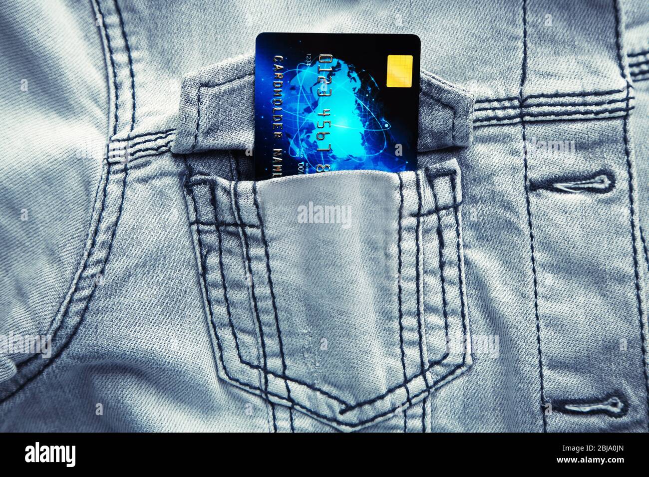 Credit card in pocket Stock Photo - Alamy