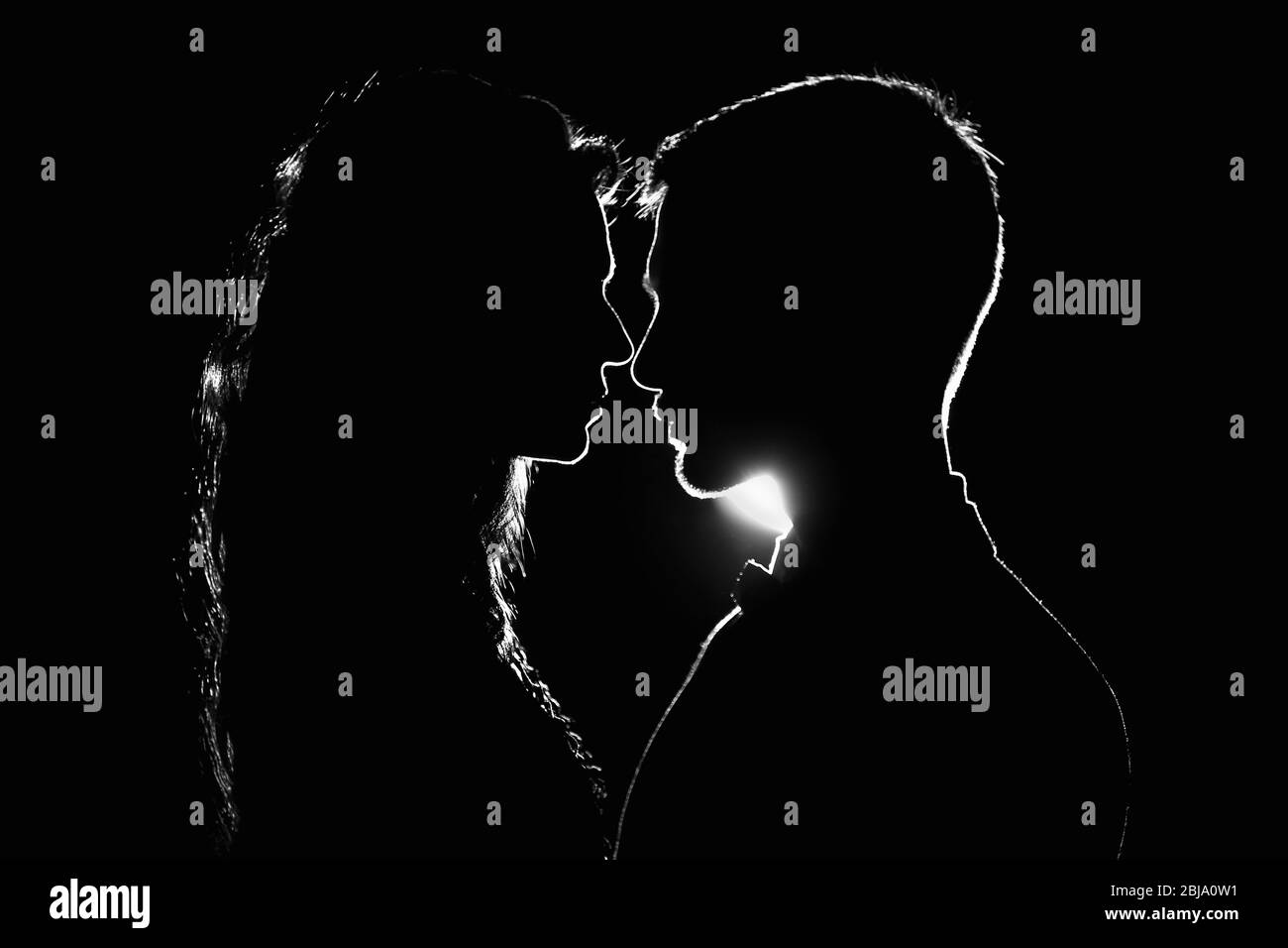 Shadow of beautiful young couple Stock Photo - Alamy