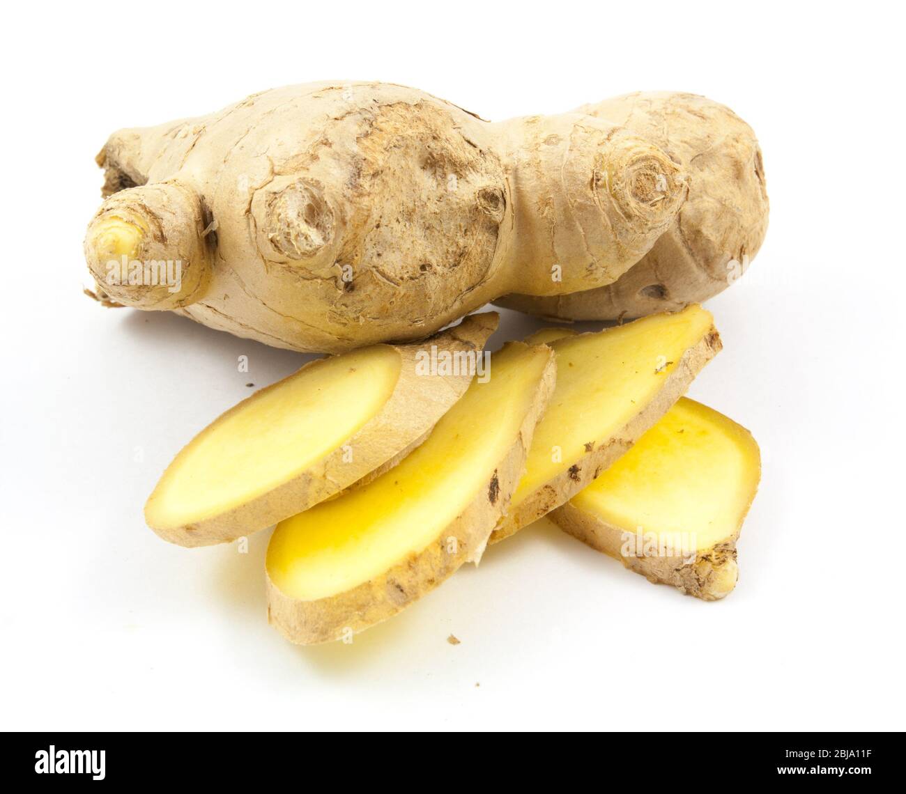 fresh ginger slide on white background Stock Photo - Alamy