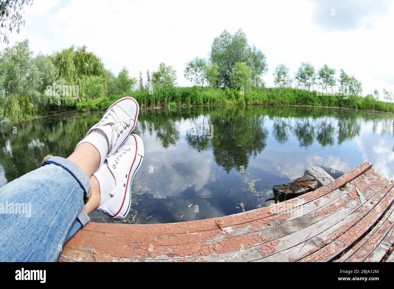 Woman legs on wooden hi-res stock photography and images - Alamy