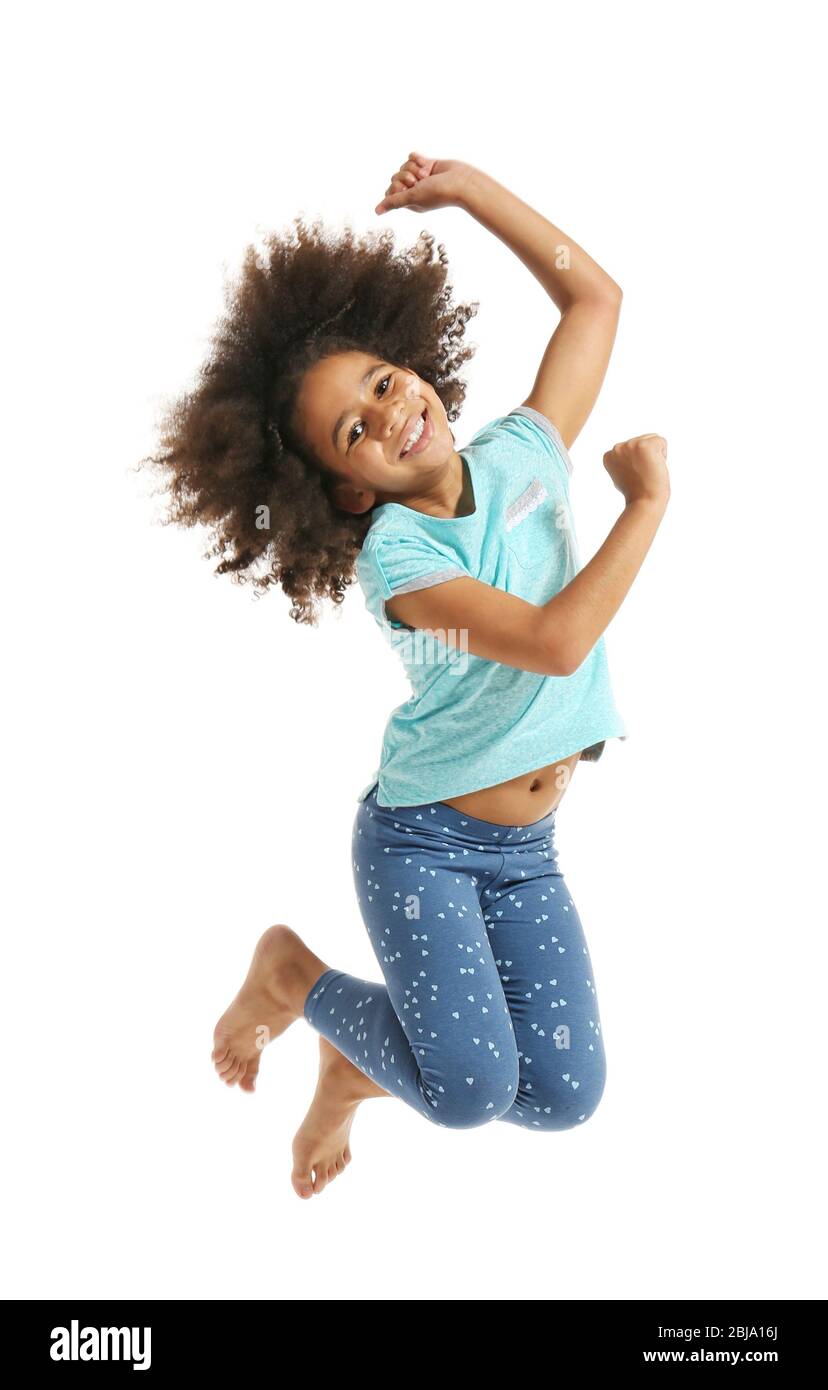 Happy African girl jumping, isolated on white Stock Photo - Alamy