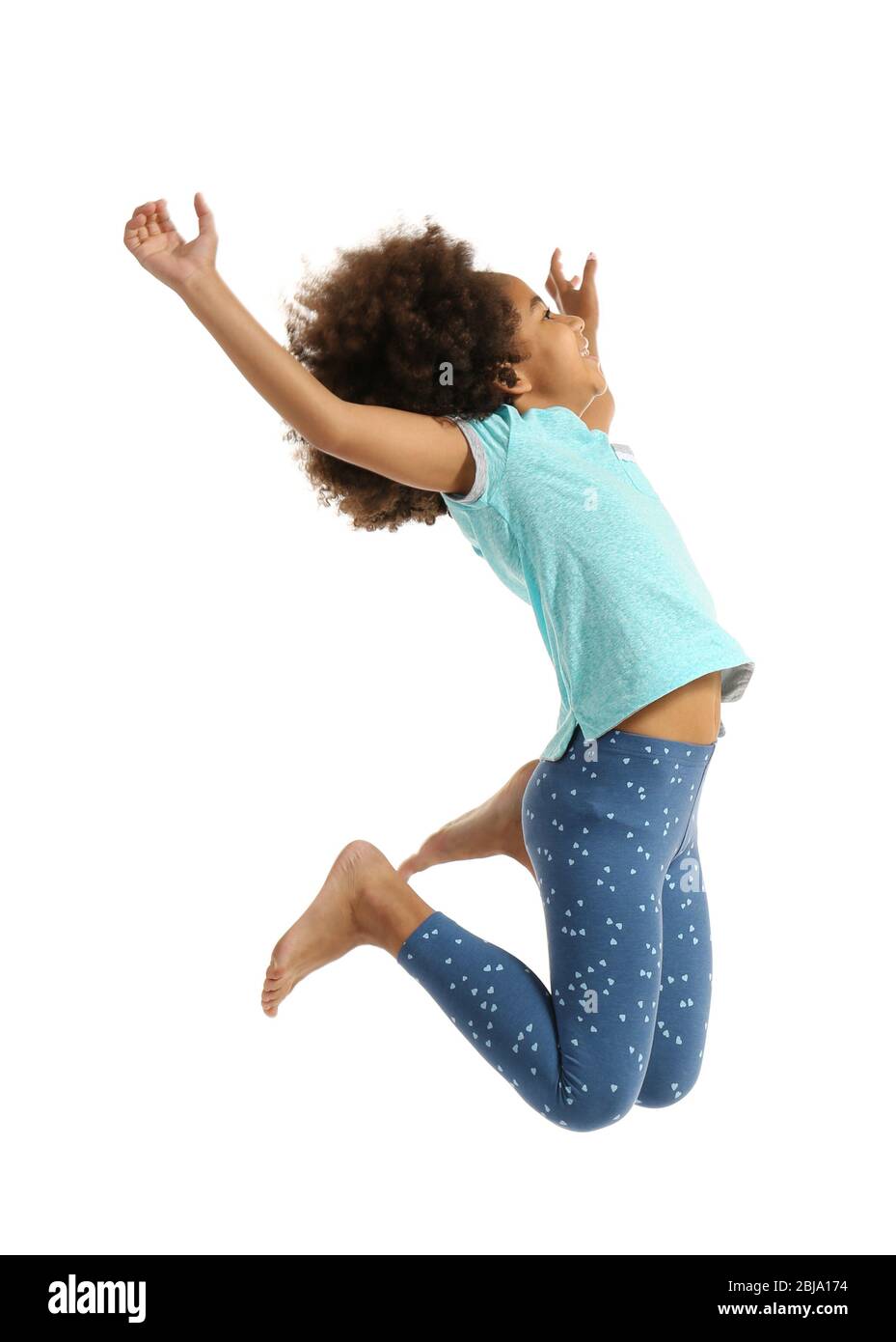 Happy African girl jumping, isolated on white Stock Photo - Alamy