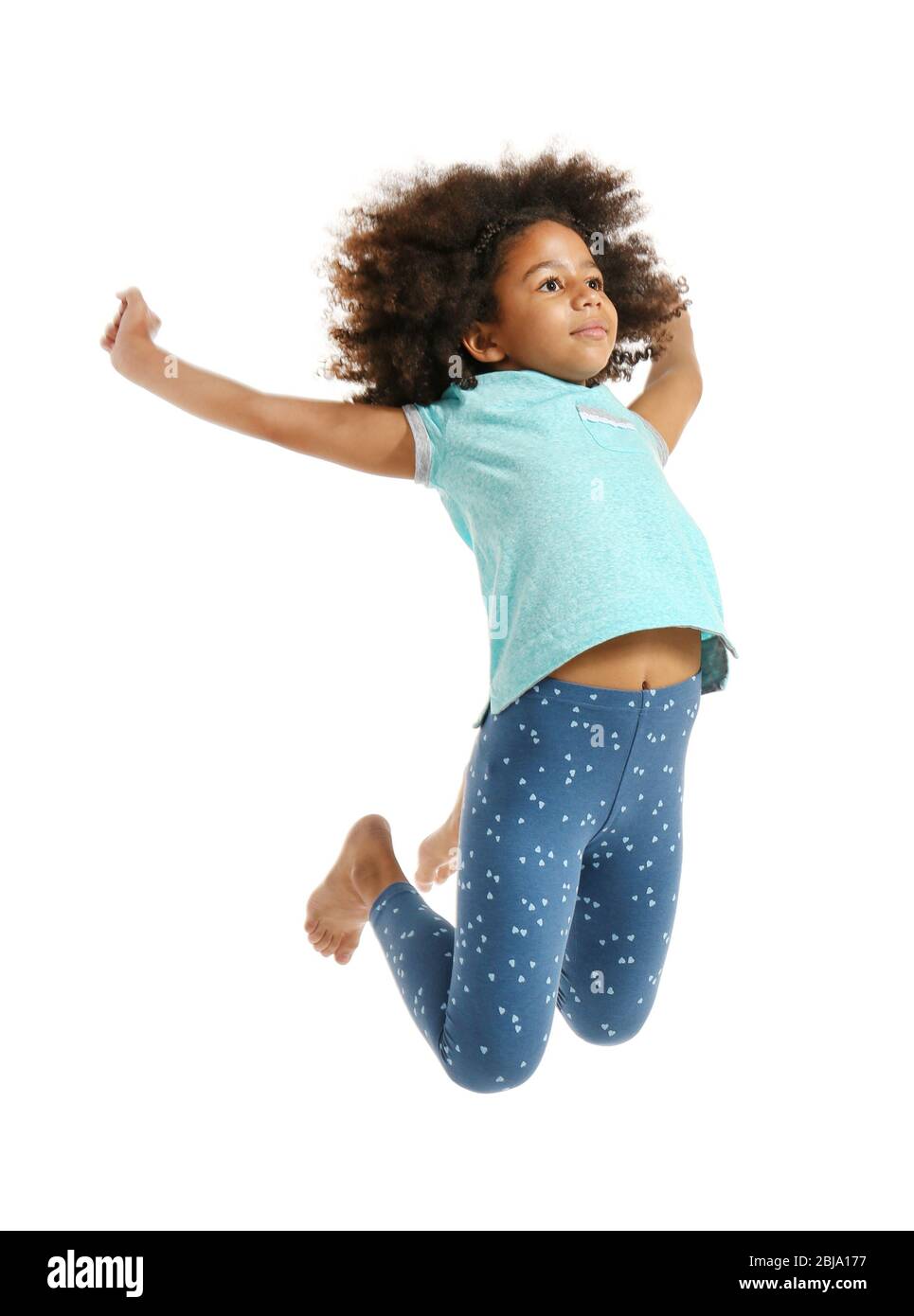 Happy African girl jumping, isolated on white Stock Photo - Alamy