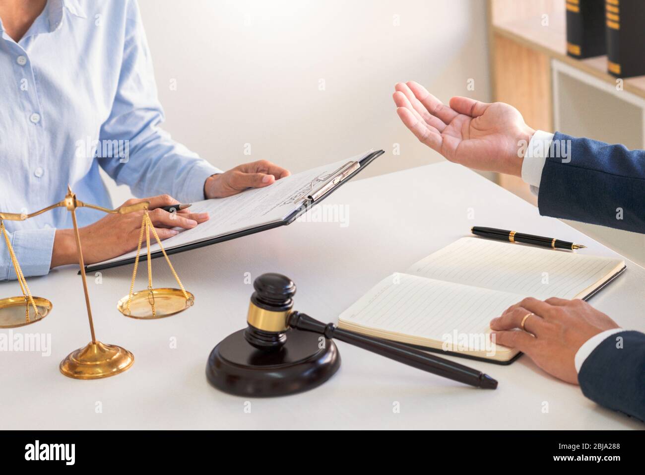 Lawyer client negotiating hi-res stock photography and images - Alamy