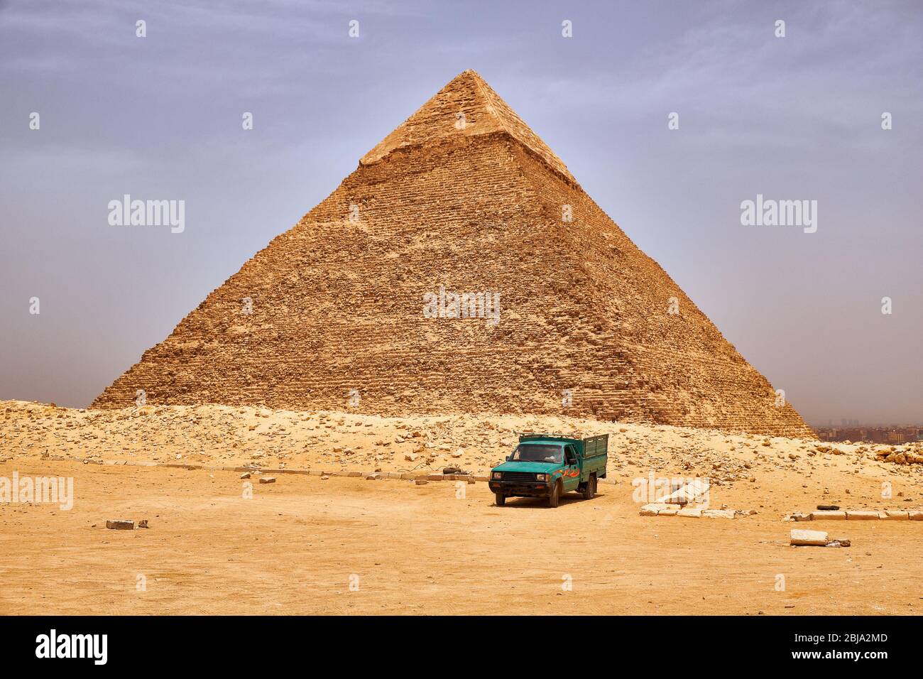 Four-wheel drive truck parked in front of the The Pyramid of Khafre ...