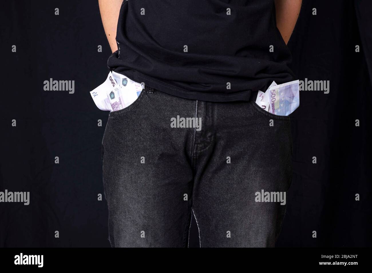 A concept without money. A man shows empty pockets. no money for karate ...