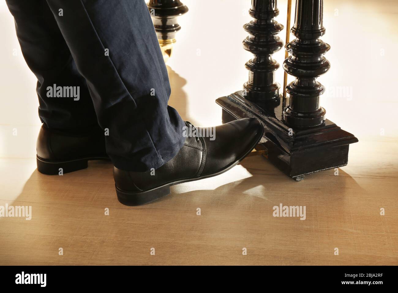 Man feet while playing piano Stock Photo - Alamy