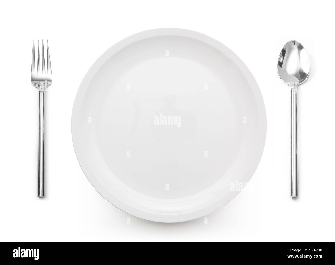 White Place Setting With Plate Fork And Spoon On White Stock Photo Alamy white-place-setting-with-plate-fork-and-spoon-on-white-stock-photo-alamy