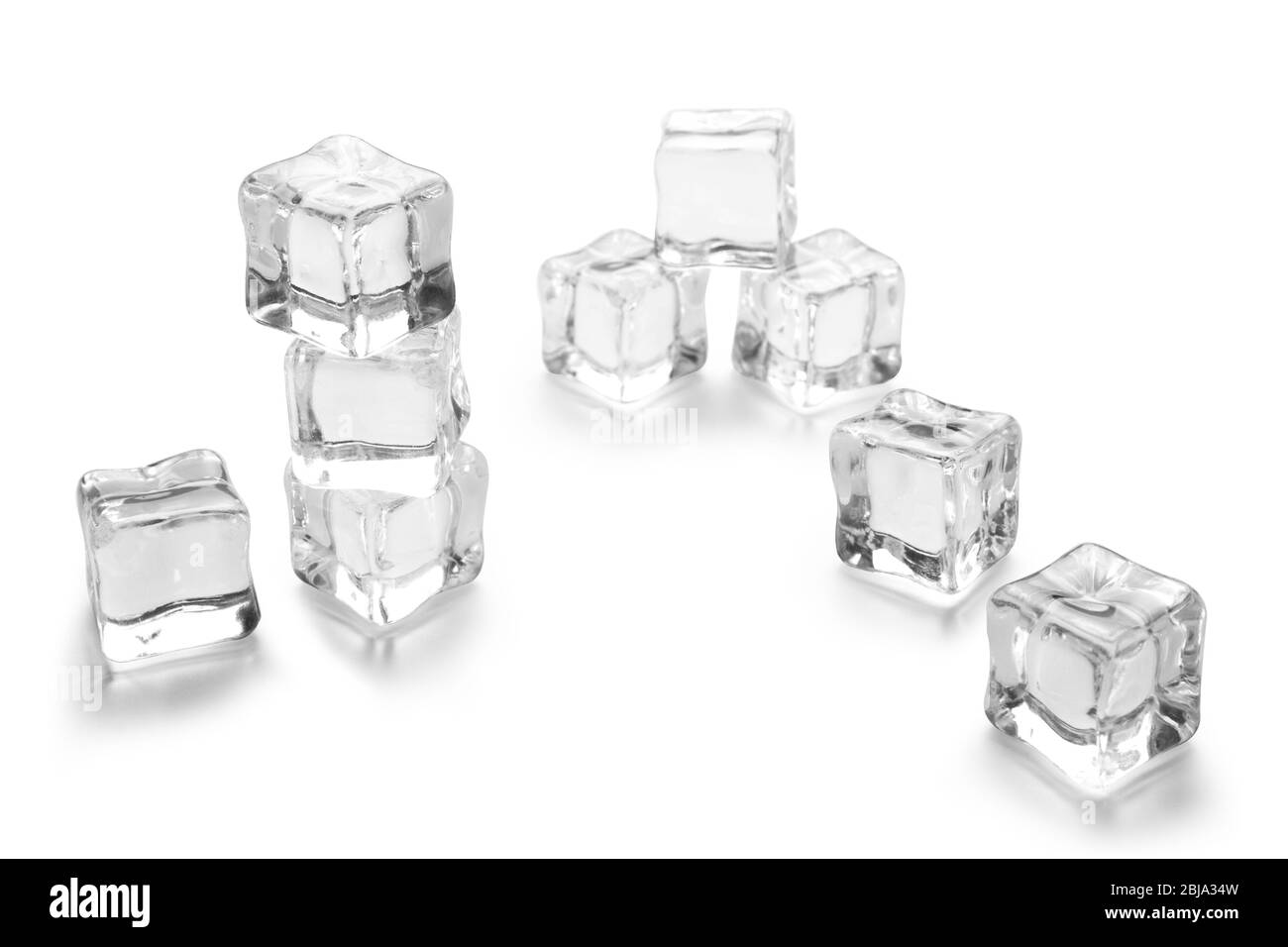 three ice cubes on white background Stock Photo - Alamy