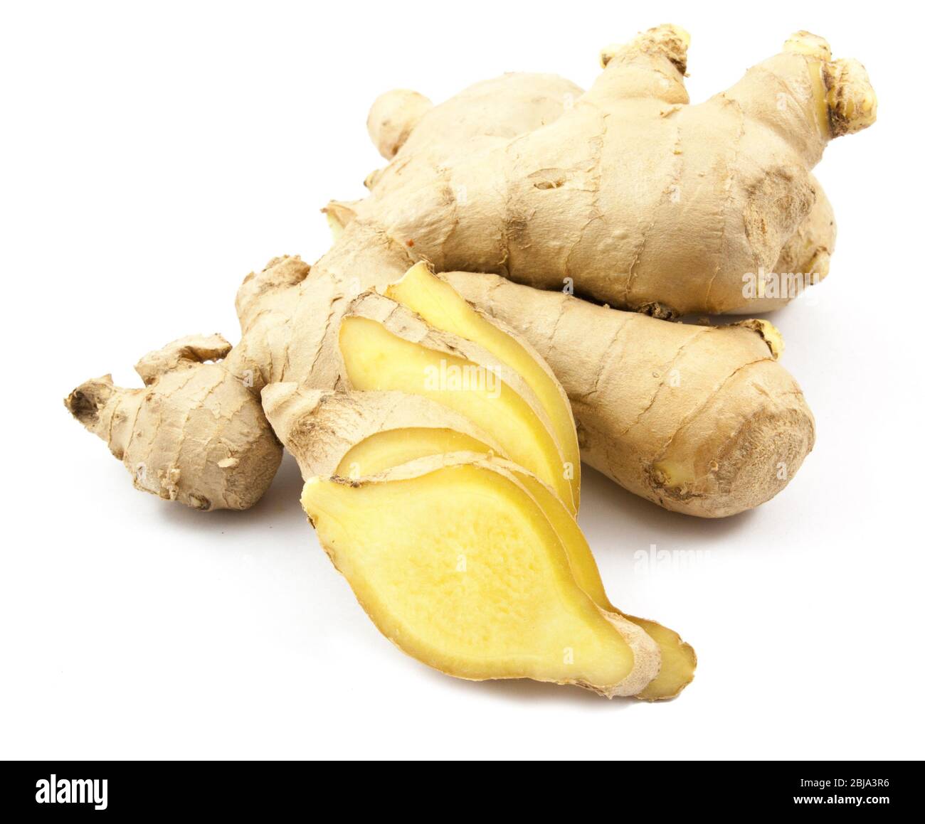 fresh ginger slide on white background Stock Photo - Alamy