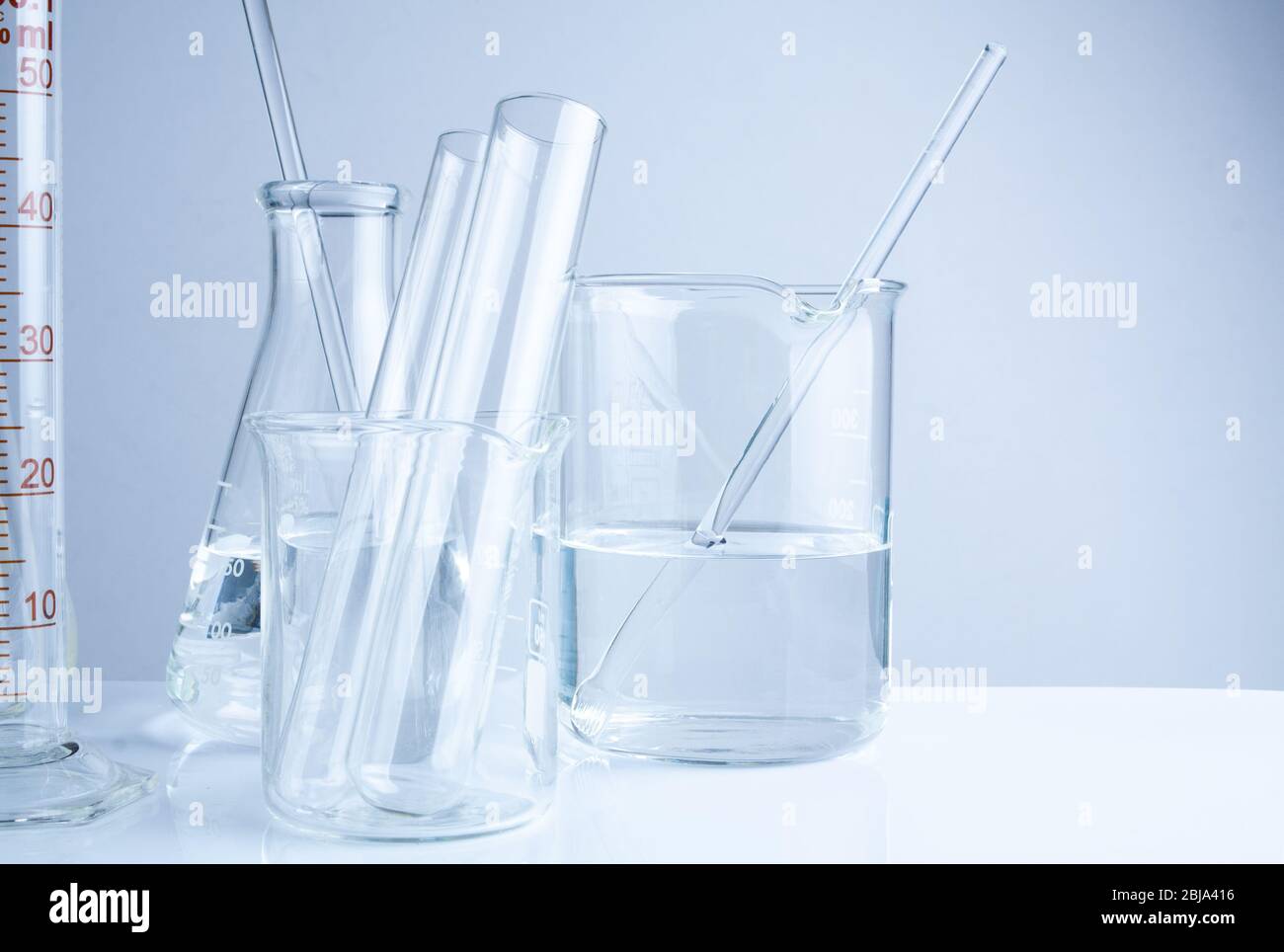 Group of laboratory glassware on table, Symbolic of science research ...