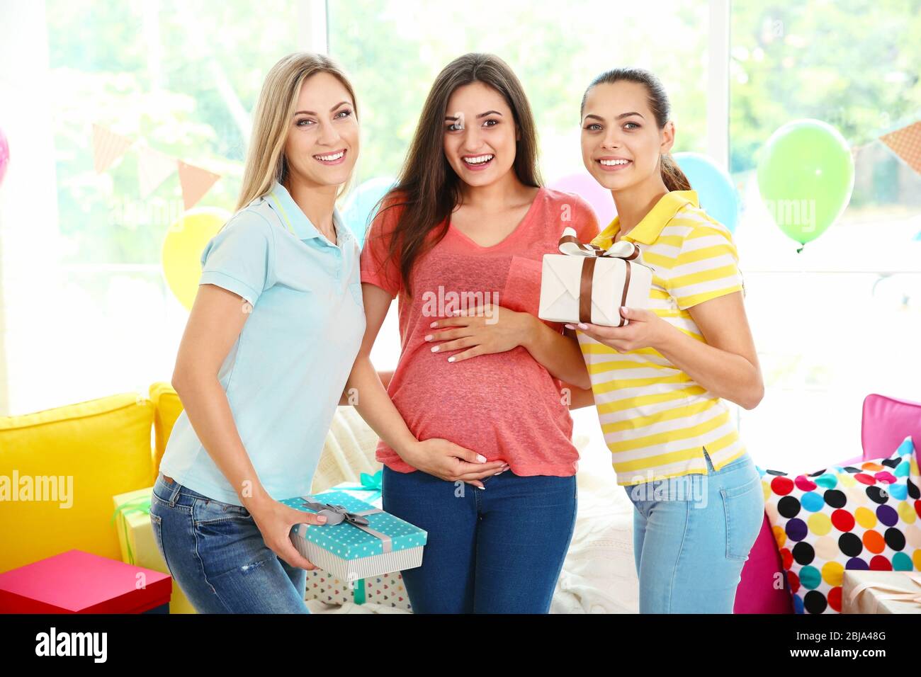Woman hold friends baby hi-res stock photography and images - Alamy