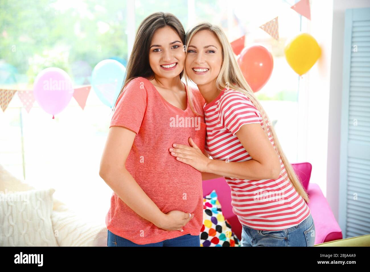 Baby touching friend hi-res stock photography and images - Alamy