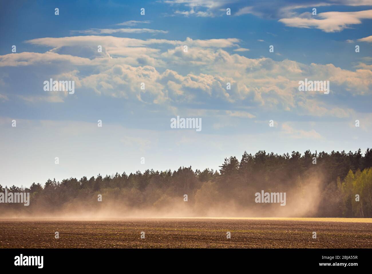 Dust storm in dry fields, dry weather infuenced by climate change Stock ...