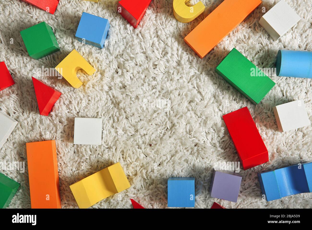 Set of wooden colorful building blocks, top view Stock Photo - Alamy