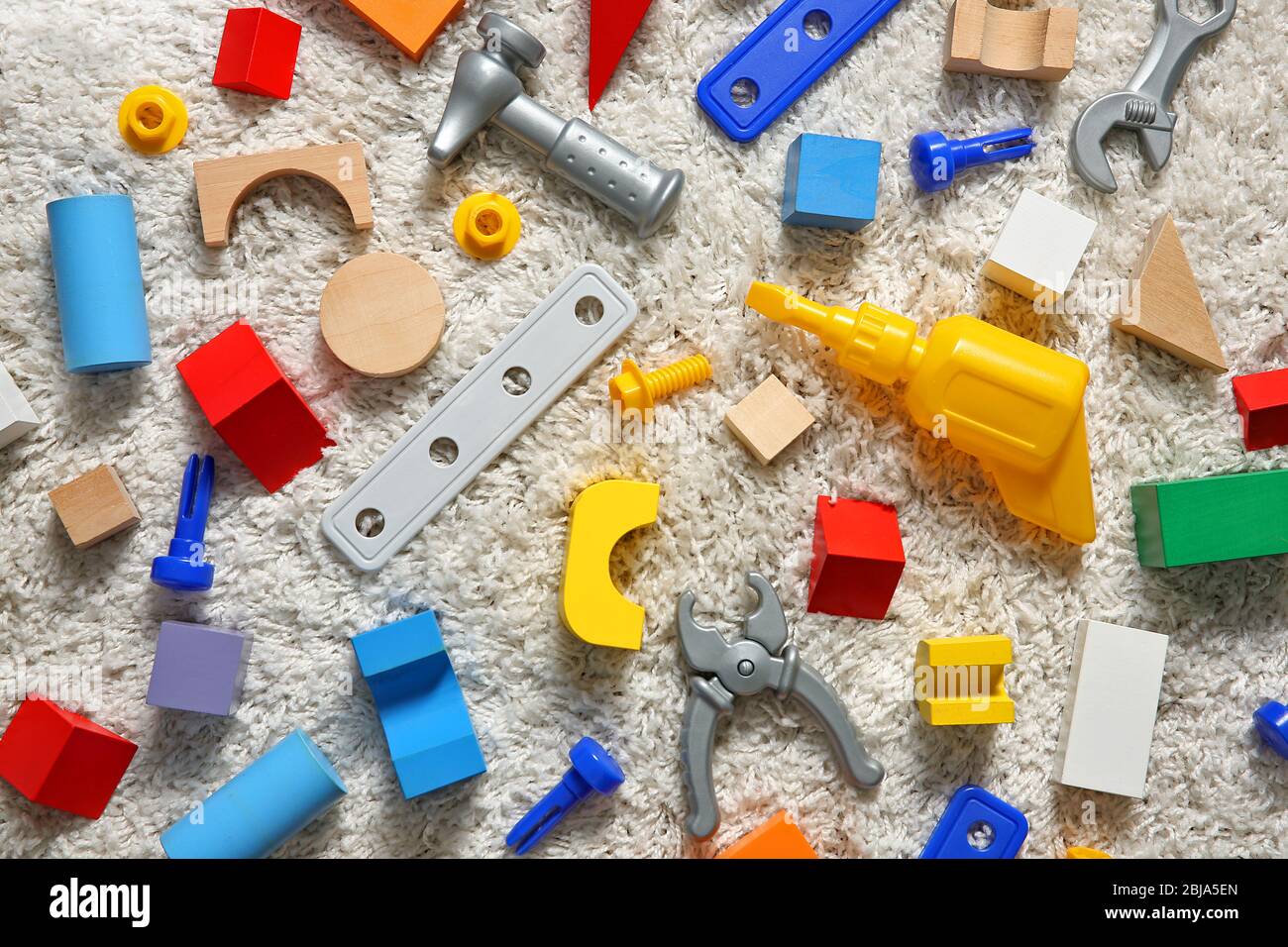 Set of colorful kids toys, top view Stock Photo - Alamy