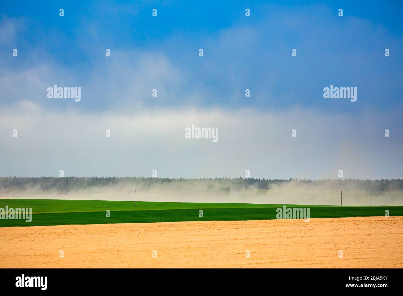 Dust storm in dry fields, dry weather infuenced by climate change Stock ...