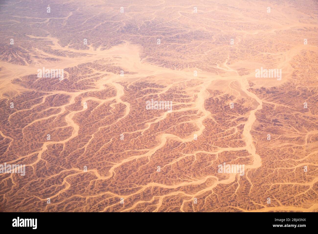 Aerial airplane view of barren Sahara desert landscape in Egypt with ...