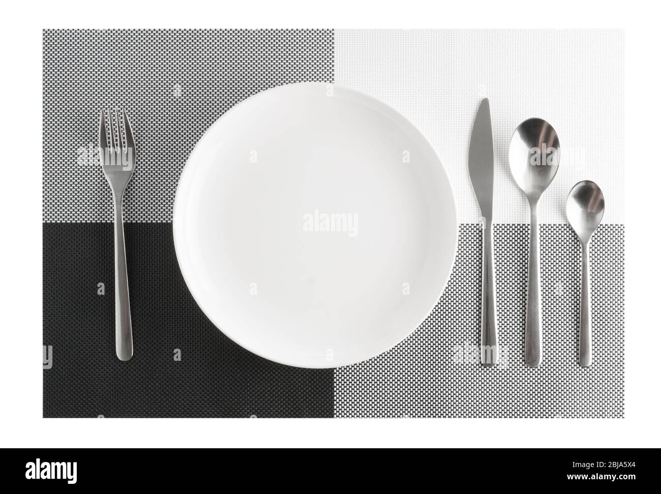 silverware or flatware set and plates isolated on white background ...