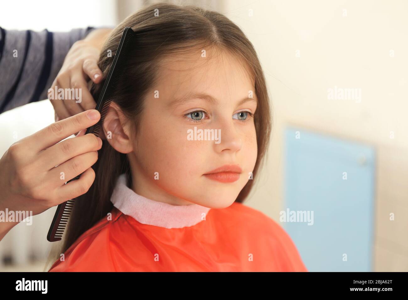 Small girl in hairdressing salon Stock Photo - Alamy