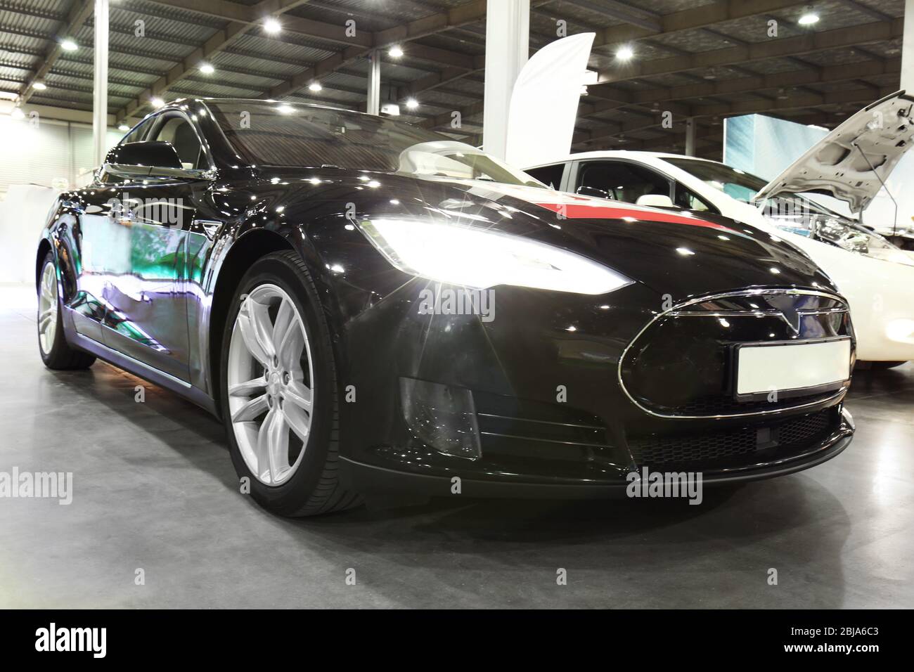 New car in the automobile salon Stock Photo - Alamy