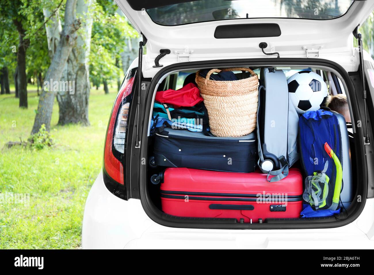 Car trunk full of bags Stock Photo - Alamy