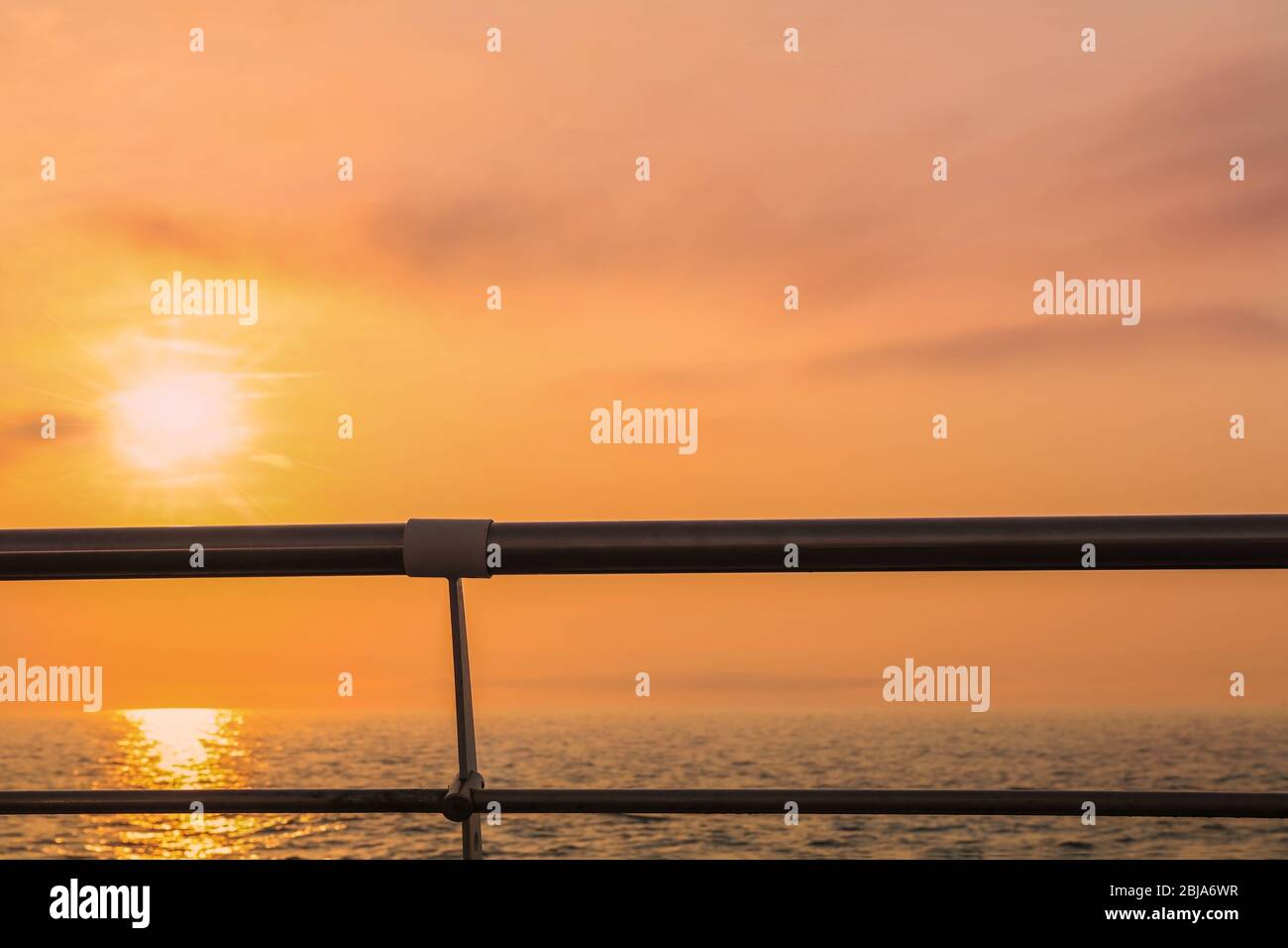 Pier fence on beautiful seascape background Stock Photo - Alamy