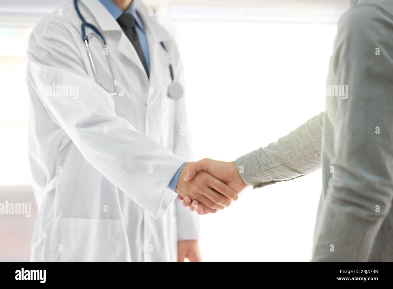 Handshaking help hi-res stock photography and images - Alamy