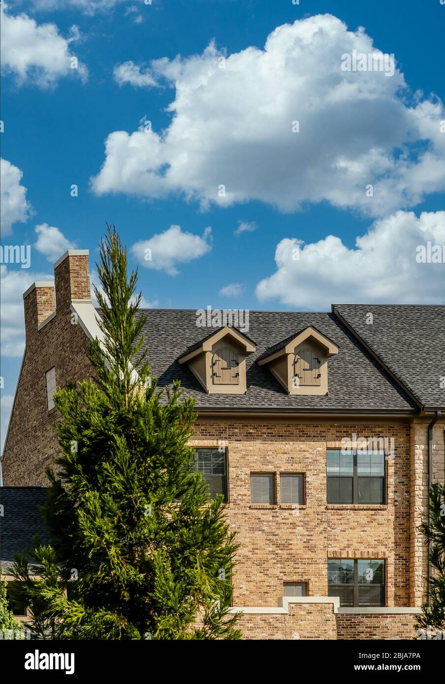 Brick Condos with Dormers Stock Photo - Alamy
