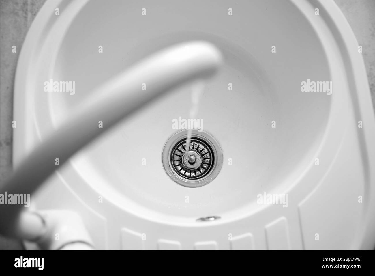 Kitchen tap top view Black and White Stock Photos & Images - Alamy