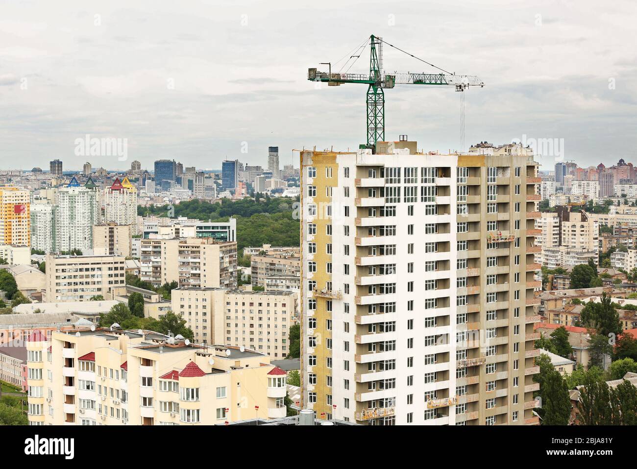 Construction site with high-rise building Stock Photo - Alamy