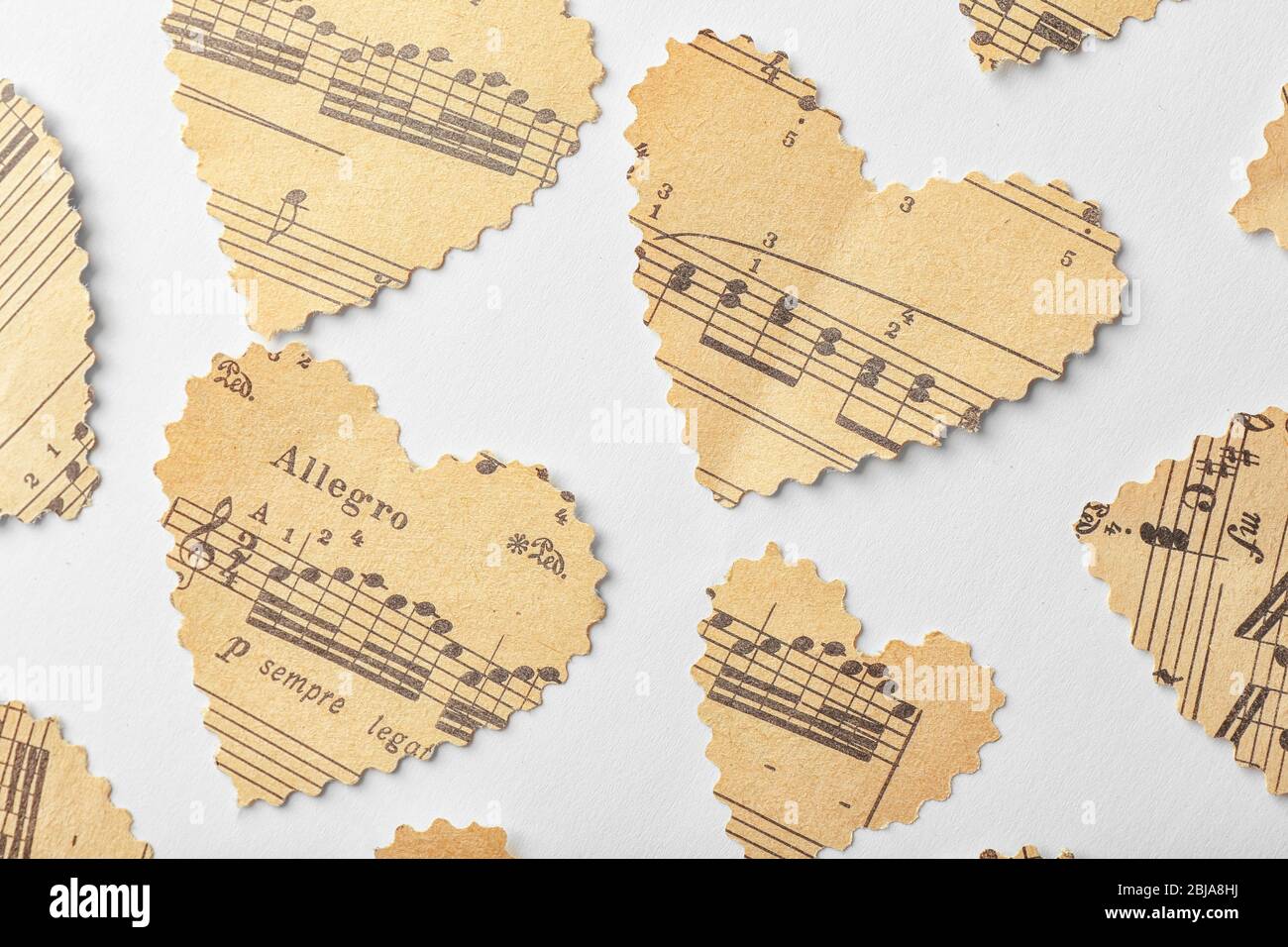 Paper hearts with notes on white background, music concept Stock Photo ...