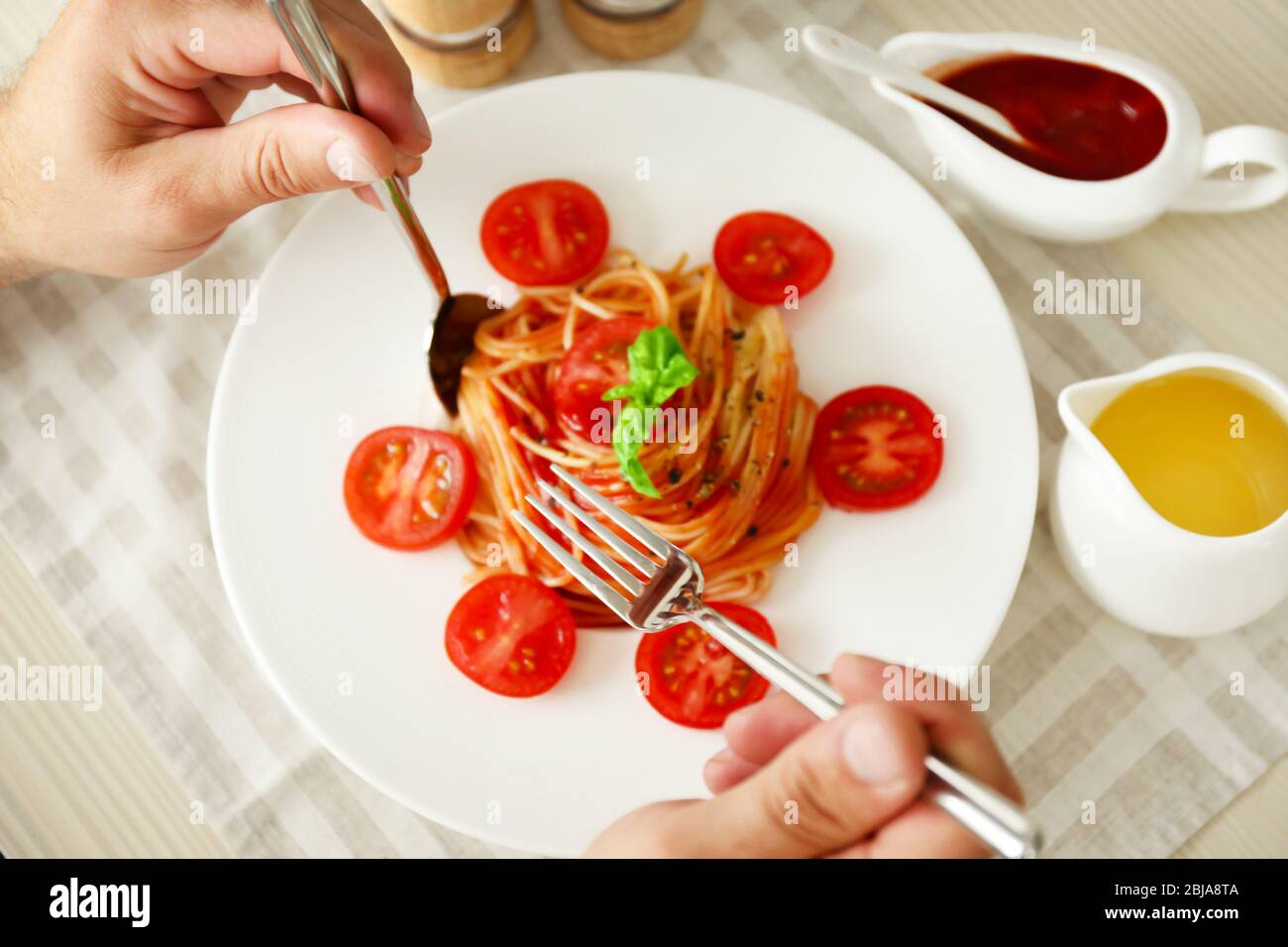 Vegetarian meal man eating pasta hi-res stock photography and images ...