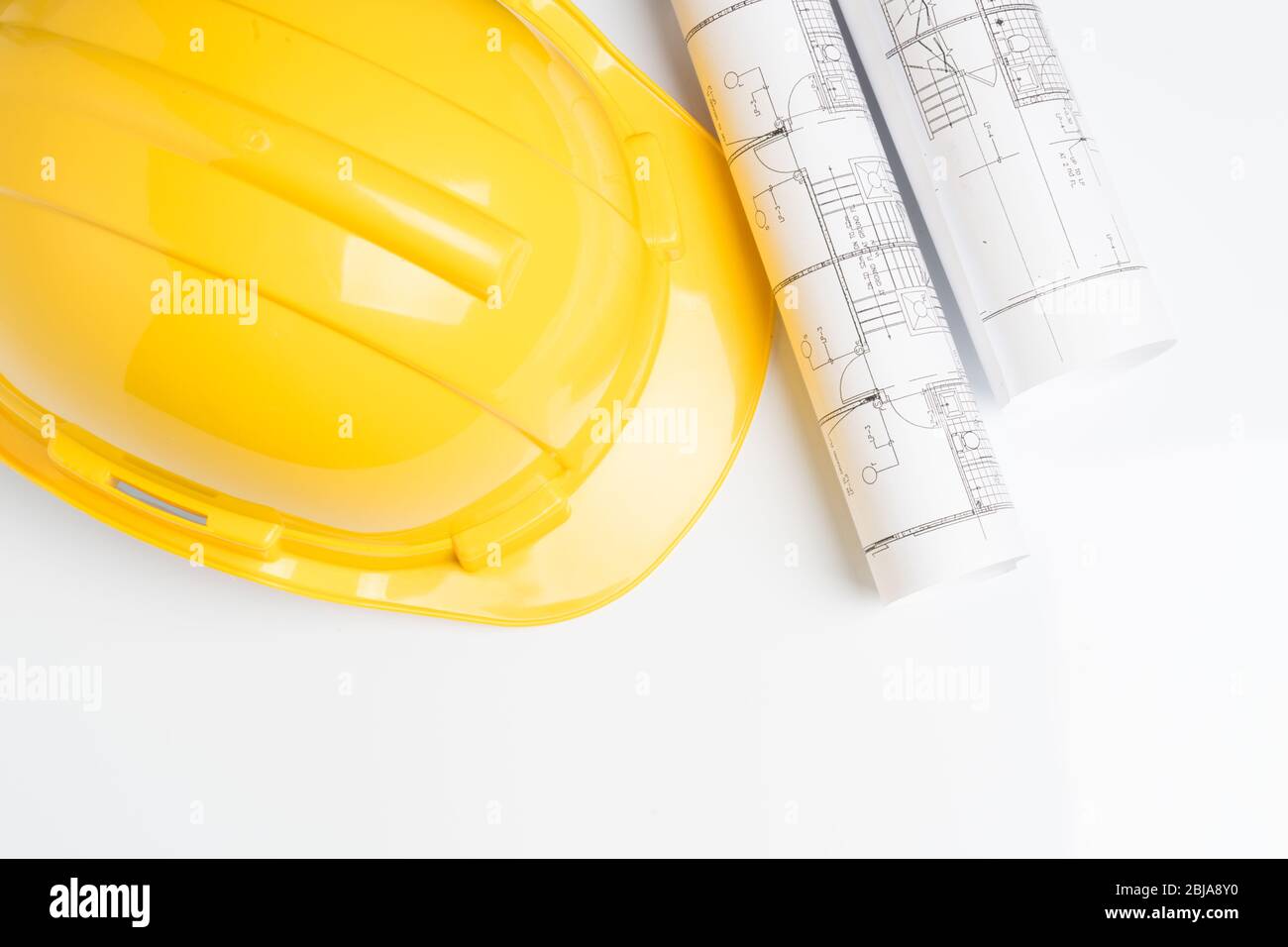 office desk with helmet on white background Stock Photo - Alamy