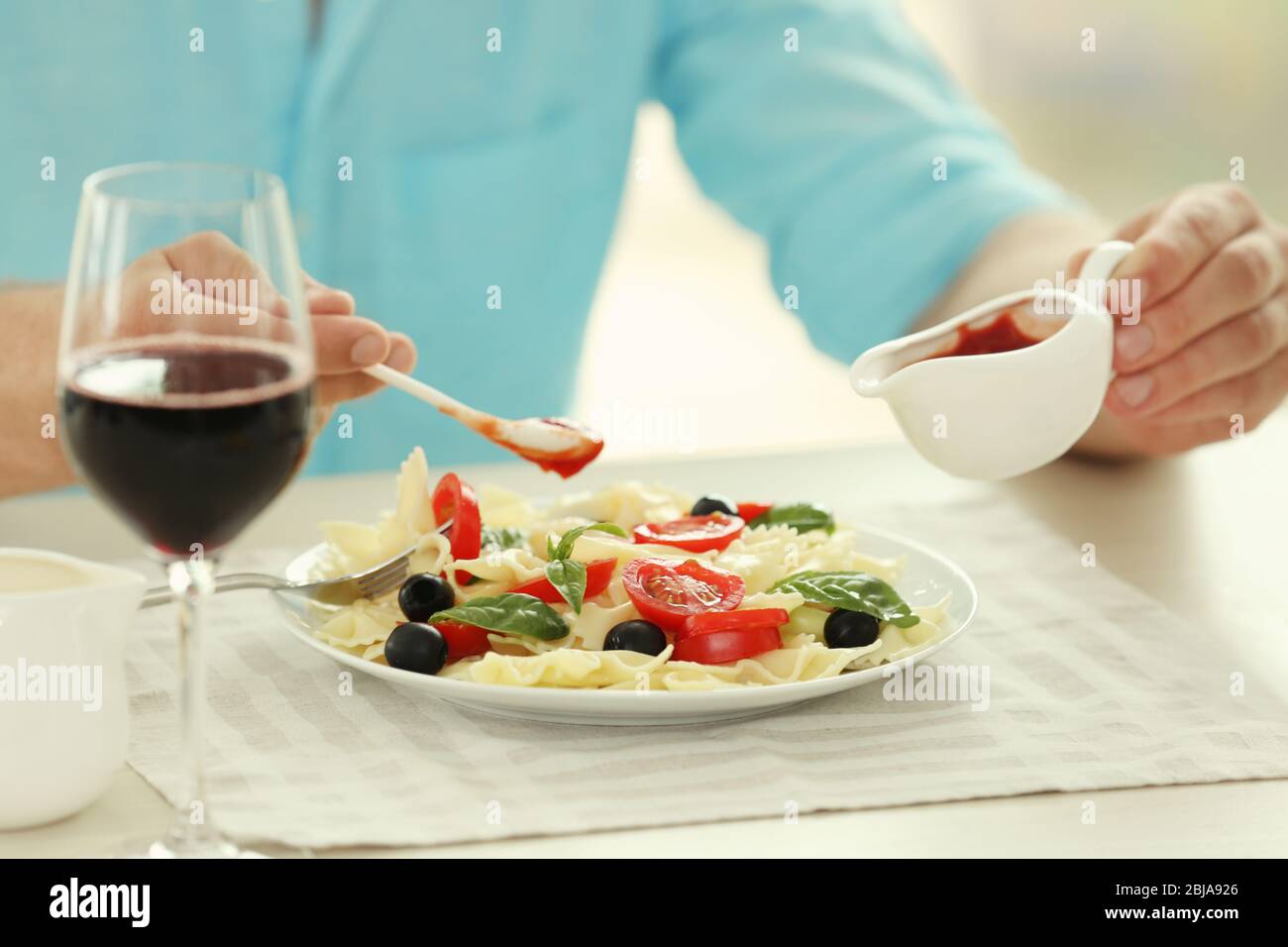 Vegetarian meal man eating pasta hi-res stock photography and images ...