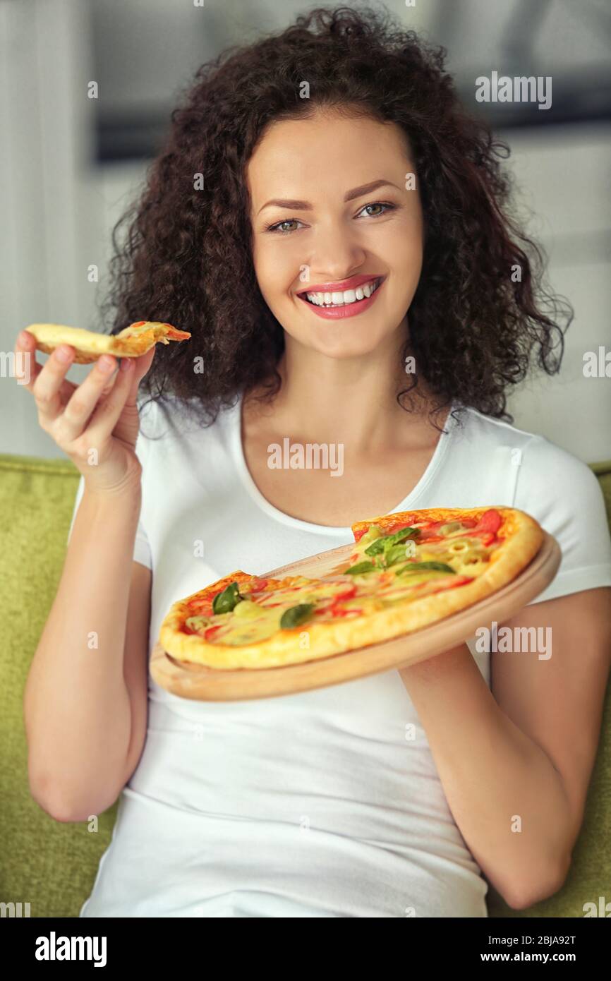 Young healthy woman eating mozzarella hi-res stock photography and images - Alamy