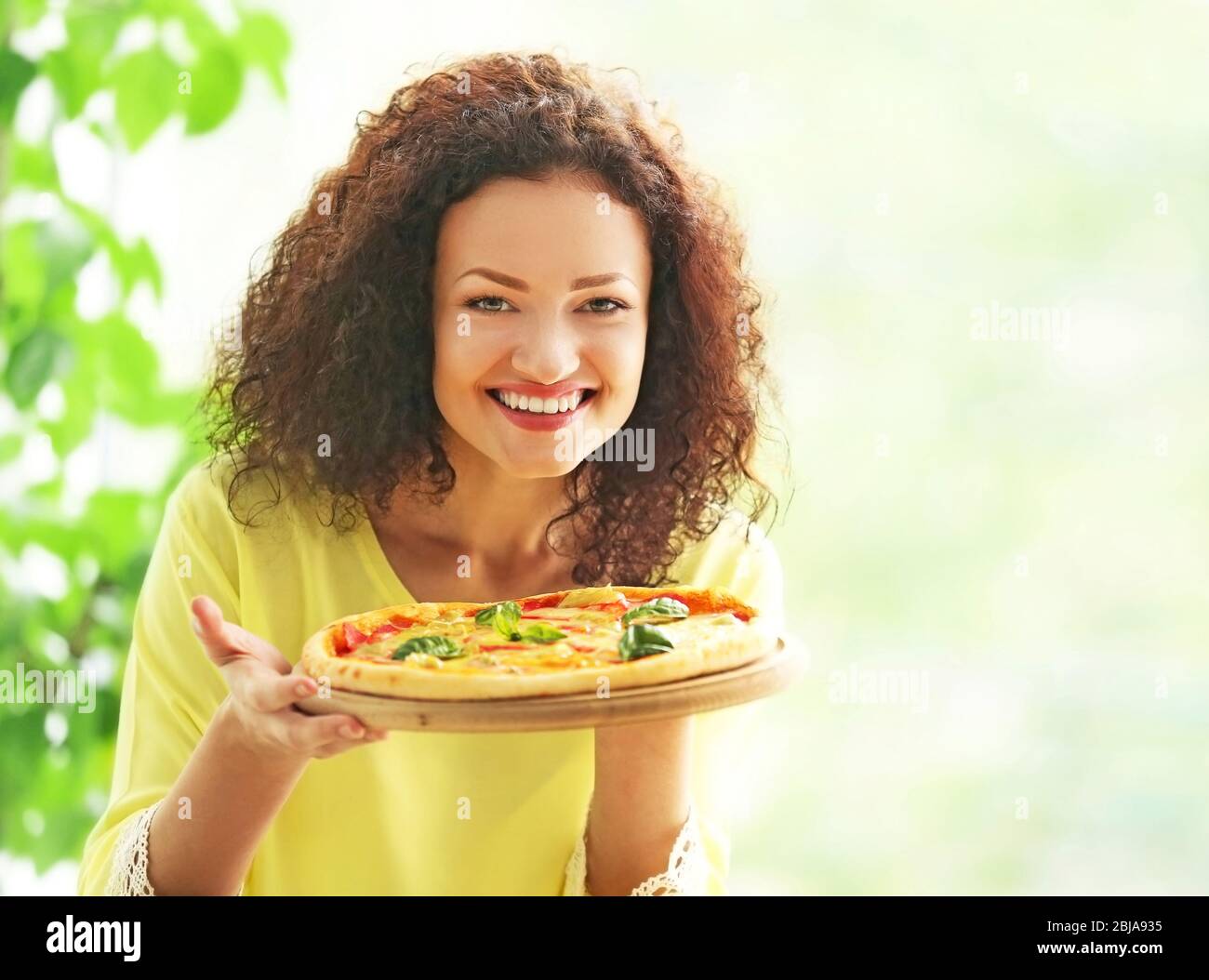 Young healthy woman eating mozzarella hi-res stock photography and images - Alamy
