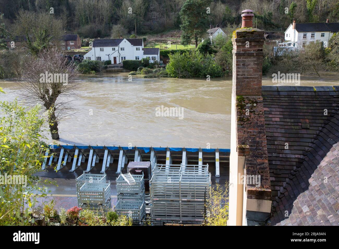 Flood Barriers At Ironbridge In Shropshire With The River Severn In