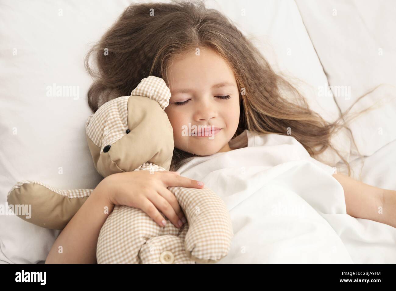 Girl sleeping teddy bear in hi-res stock photography and images - Alamy