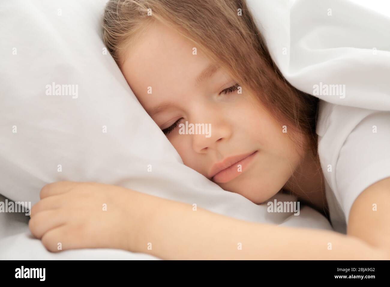 Adorable sleeping little girl, close up Stock Photo - Alamy